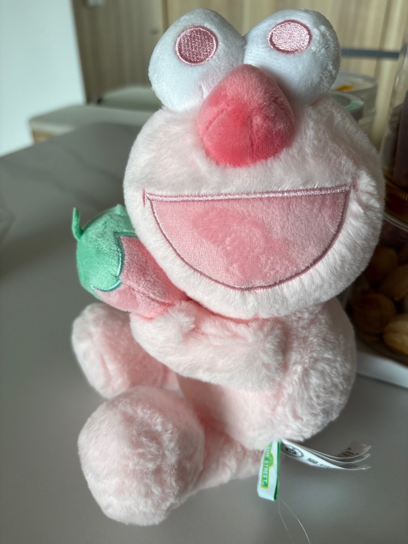 Elmo with strawberry in Pink, Hobbies & Toys, Toys & Games on Carousell