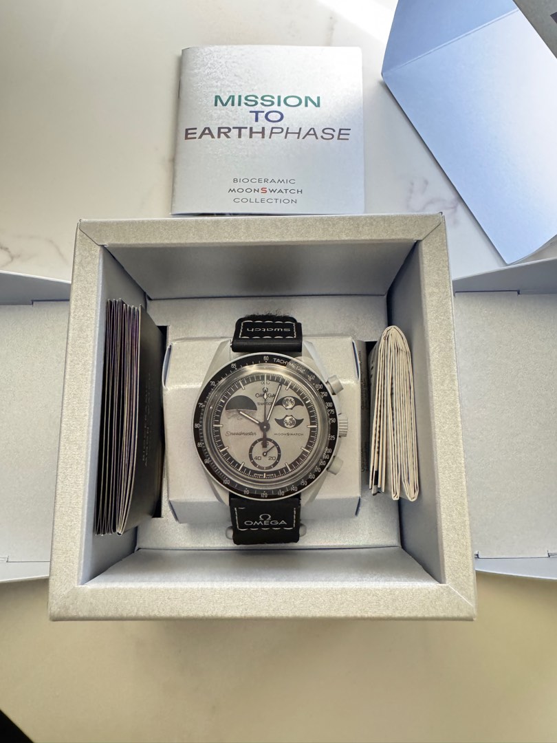 Mission to Earth Phase Omega x Swatch, Men's Fashion, Watches ...