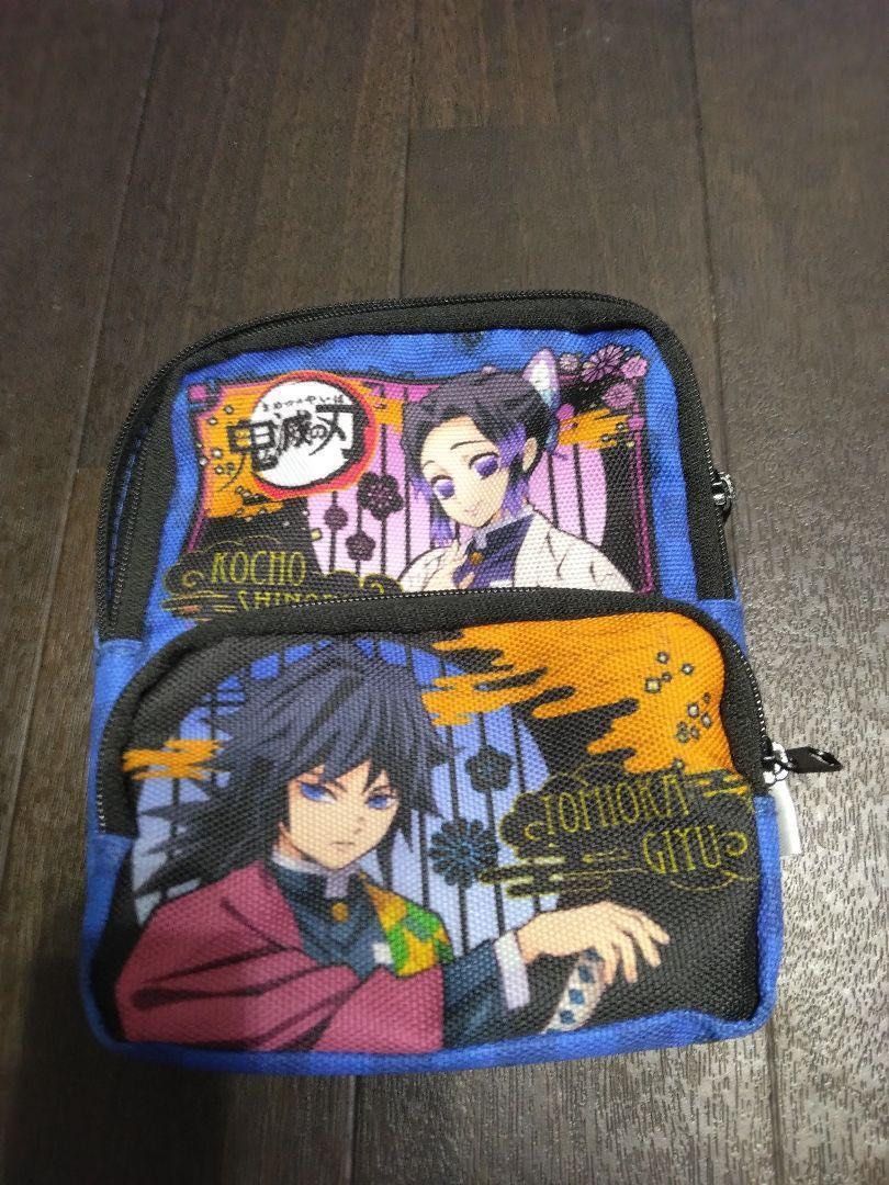 Bo1 Demon Slayer: Kimetsu no Yaiba tenugui pouch set. It features two ...