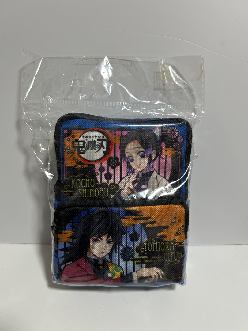 Bo1 Demon Slayer: Kimetsu no Yaiba tenugui pouch set. It features two ...