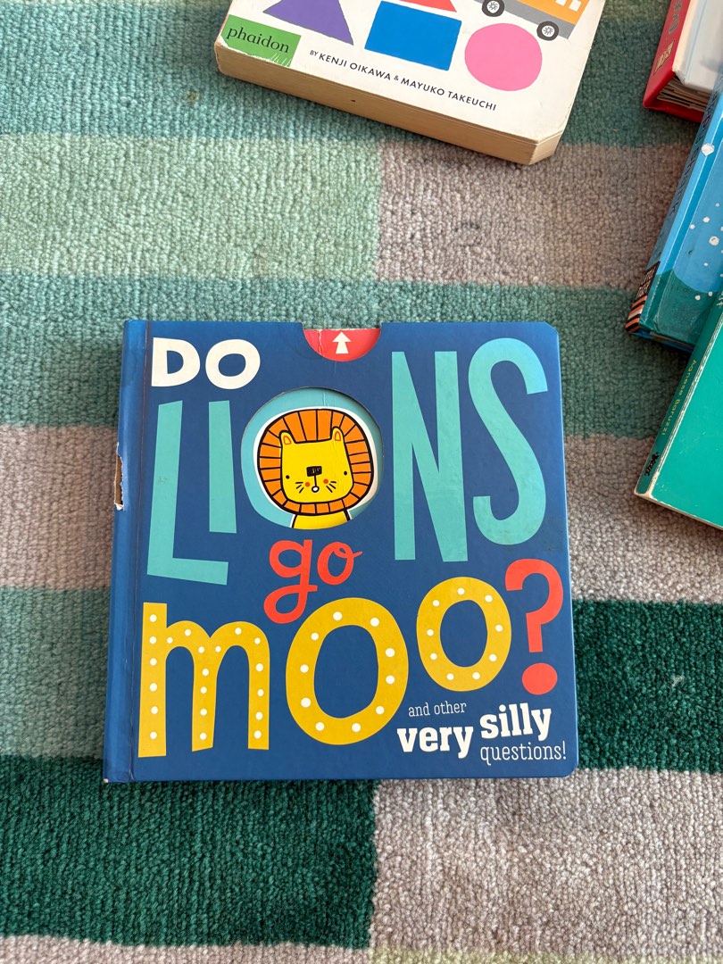 Toddler Books | Do Lions Go Moo? | Pull out book, Hobbies & Toys, Books ...