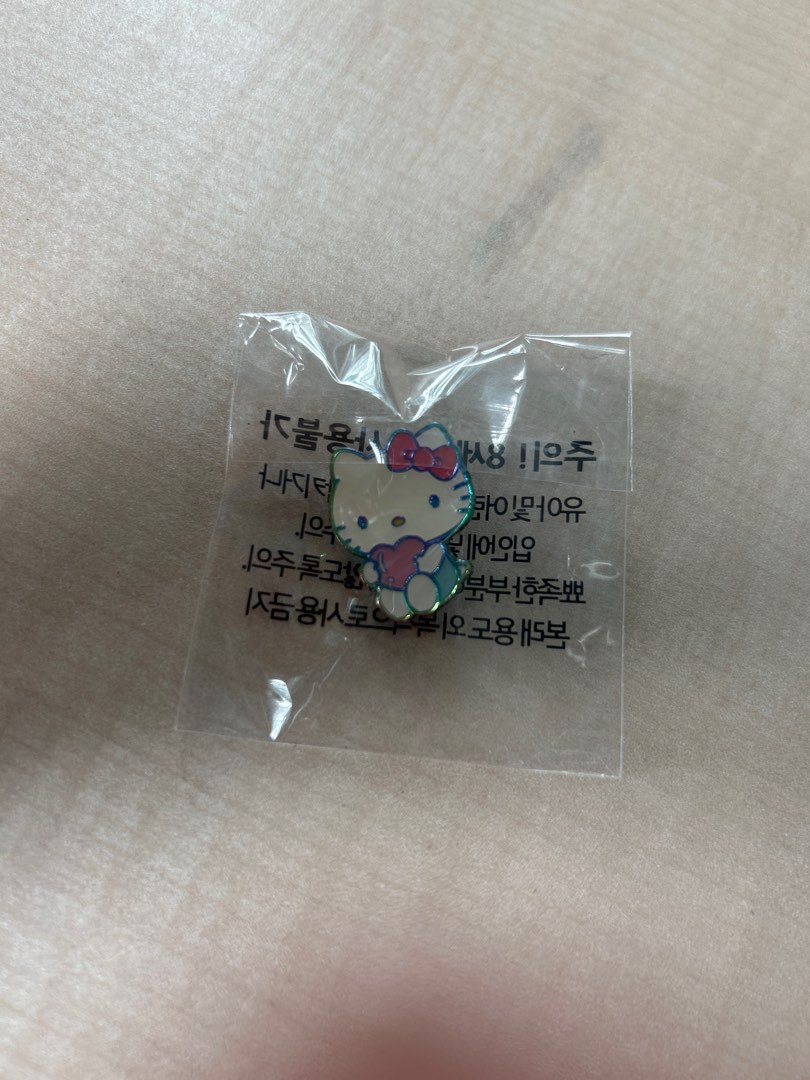 hello kitty enamel pin, Hobbies & Toys, Toys & Games on Carousell