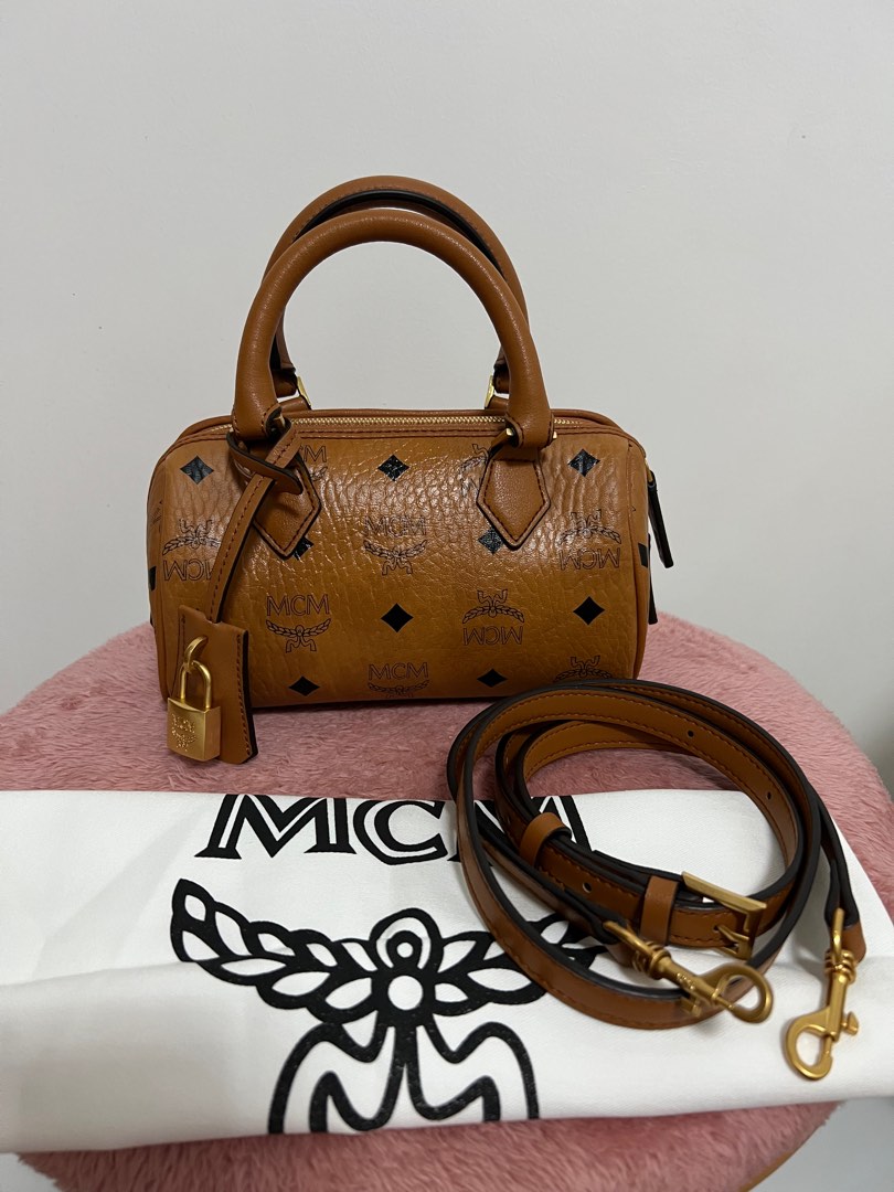 MCM Mini Duffle Bag with Sling, Luxury, Bags & Wallets on Carousell