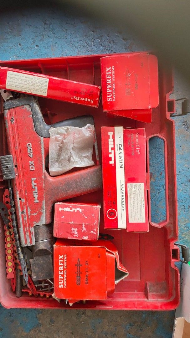 Hilti nail gun. Hitachi treading drill. drill bit. Hydraulic hand pump ...