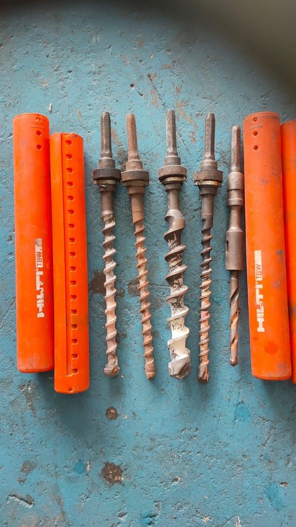 Hilti nail gun. Hitachi treading drill. drill bit. Hydraulic hand pump ...