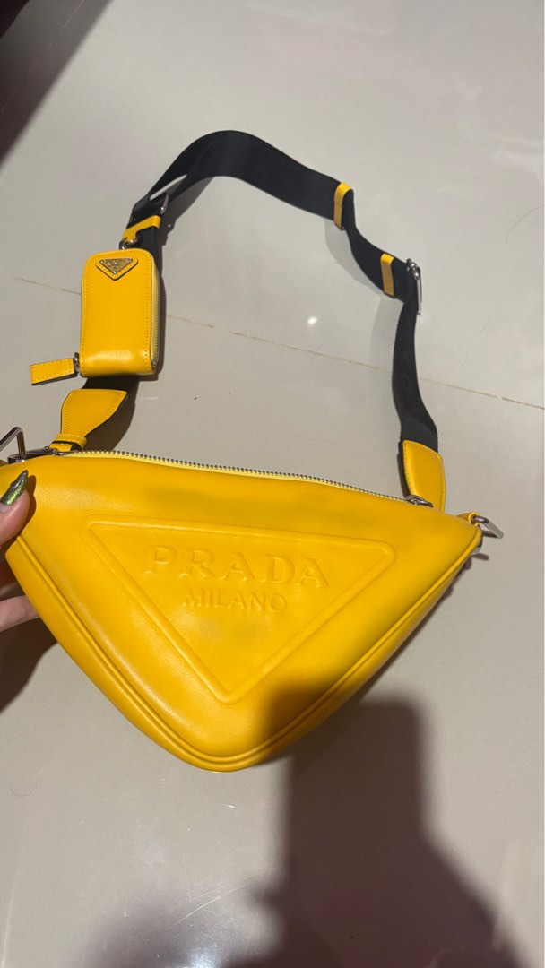 prada yellow triangle bag, Fesyen Wanita, Tas & Dompet di Carousell