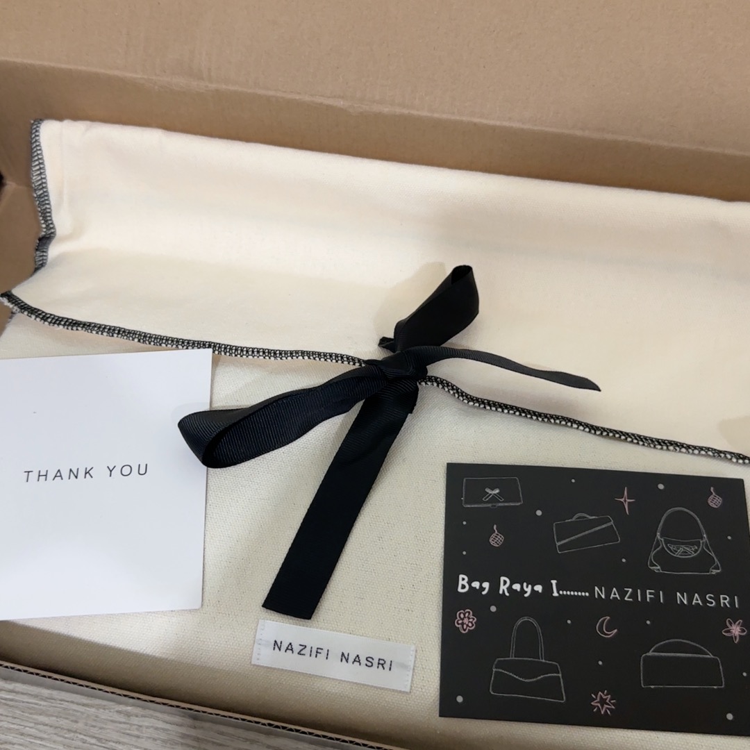 nazifi nasri symmetrical pochette, Luxury, Bags & Wallets on Carousell