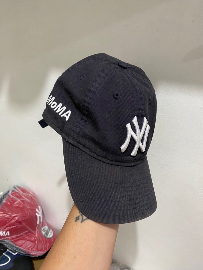 New era x moma navy adjustable cap, Men's Fashion, Watches & Accessories, Caps & Hats on Carousell