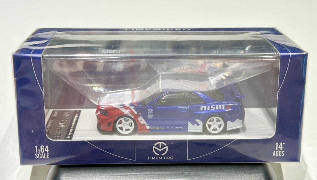 TimeMicro 1/64 Nissan Skyline R34 GTR Z-Tune Nismo Livery with a human ...