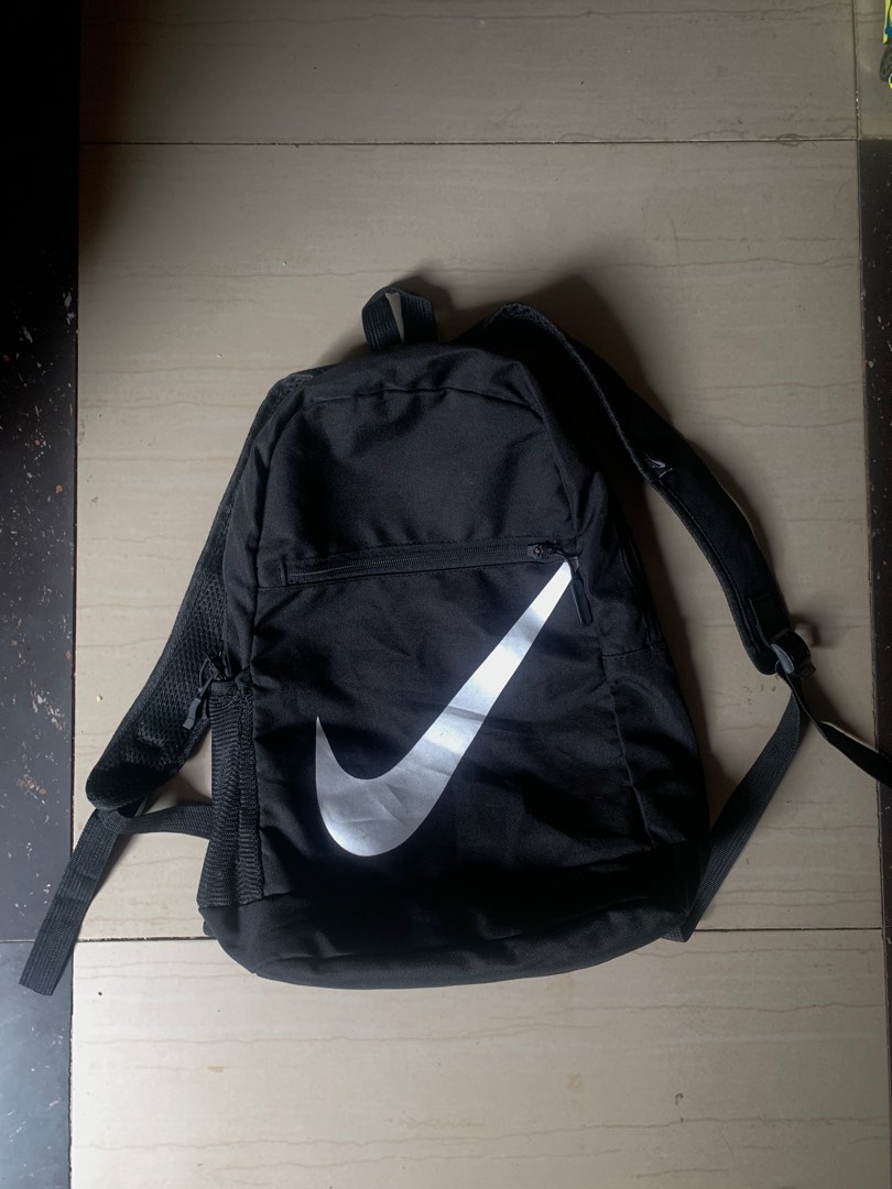 Nike big swoosh, Men's Fashion, Bags, Backpacks on Carousell