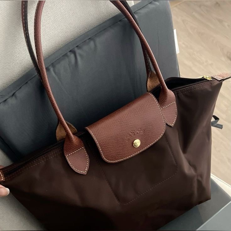 Longchamp le pliage ebony medium long handle, Luxury, Bags & Wallets on ...