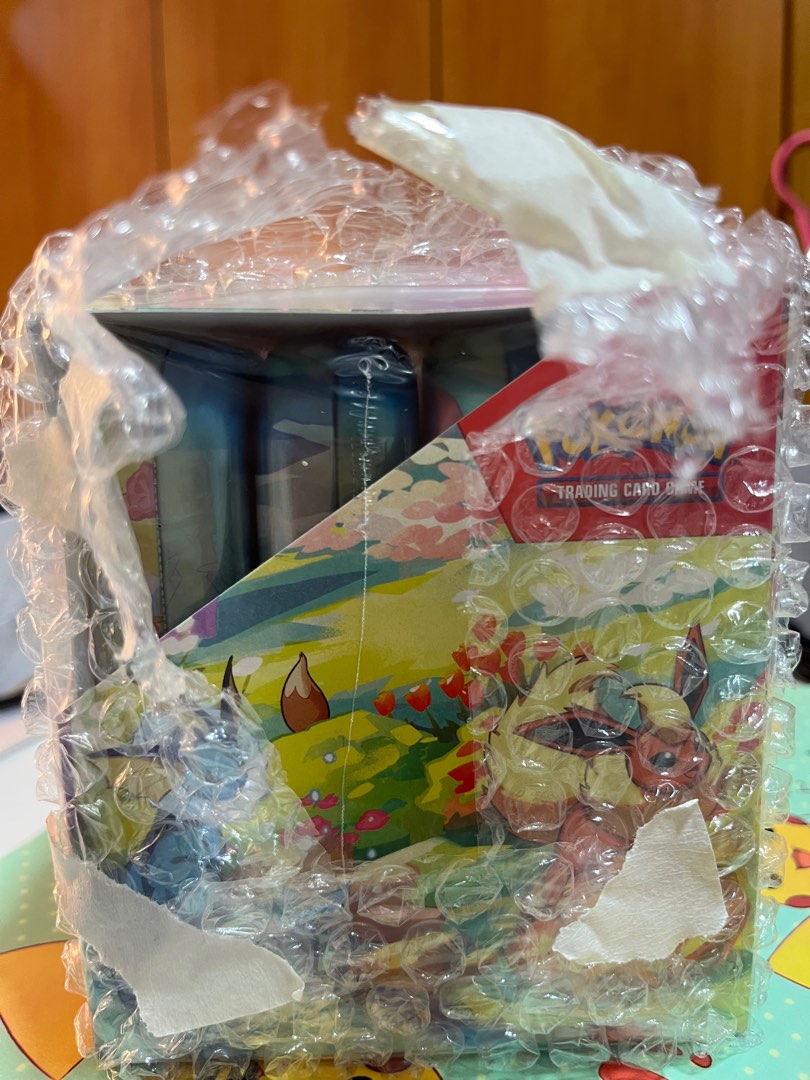 Prismatic evolution tins, Hobbies & Toys, Toys & Games on Carousell