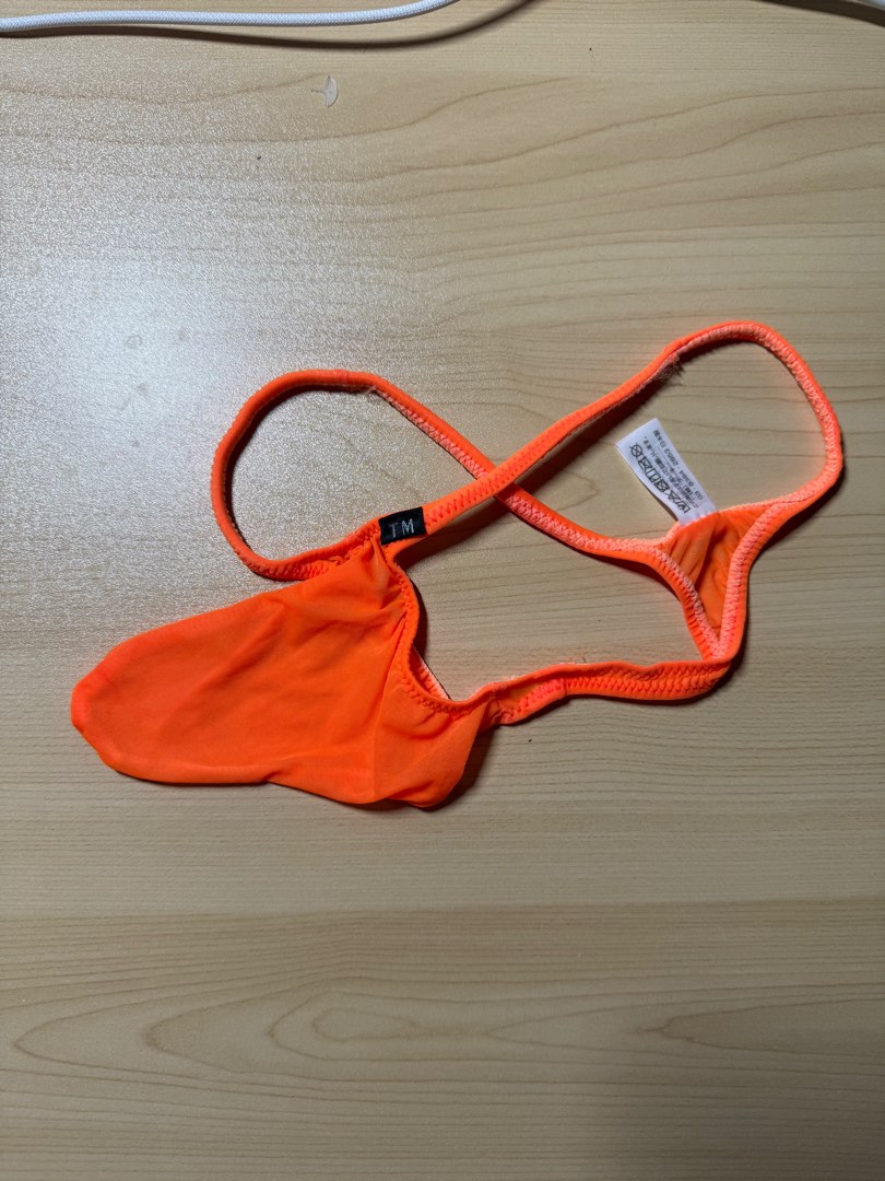TM orange thong bikini, Men's Fashion, Bottoms, New Underwear on Carousell