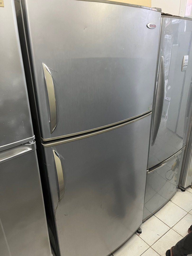 SINGER Fridge freezer 2 door good condition one month warntey ada, TV ...