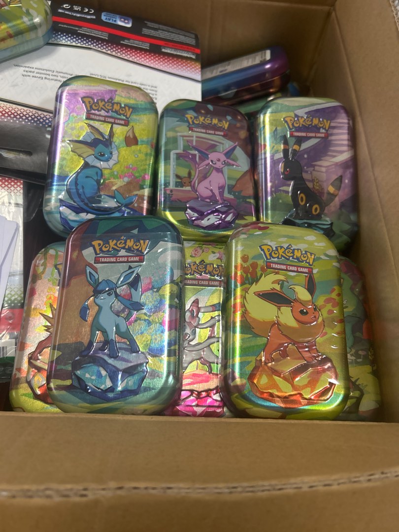 prismatic evolution mini tins, Hobbies & Toys, Toys & Games on Carousell