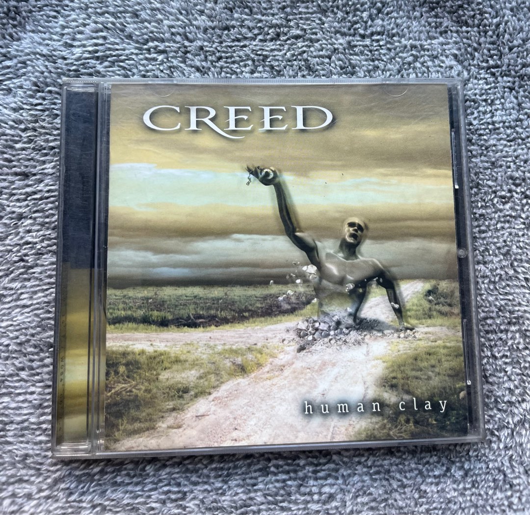 Creed - Human Clay, Hobbies & Toys, Music & Media, CDs & DVDs on Carousell