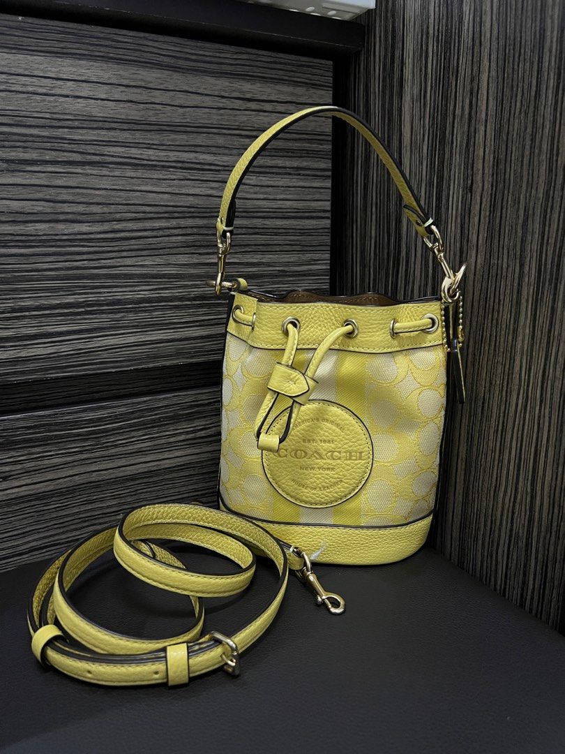 Coach yellow bucket bag, Women's Fashion, Bags & Wallets, Shoulder Bags ...