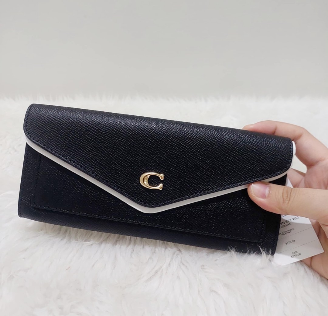 Coach envelope wallet (retail), Luxury, Bags & Wallets on Carousell
