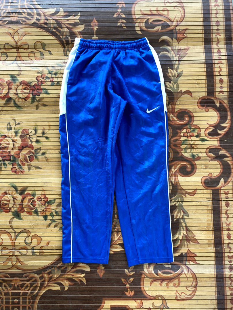 Nike Baggy Trackpant kain seluar sukan, Men's Fashion, Bottoms, Joggers ...