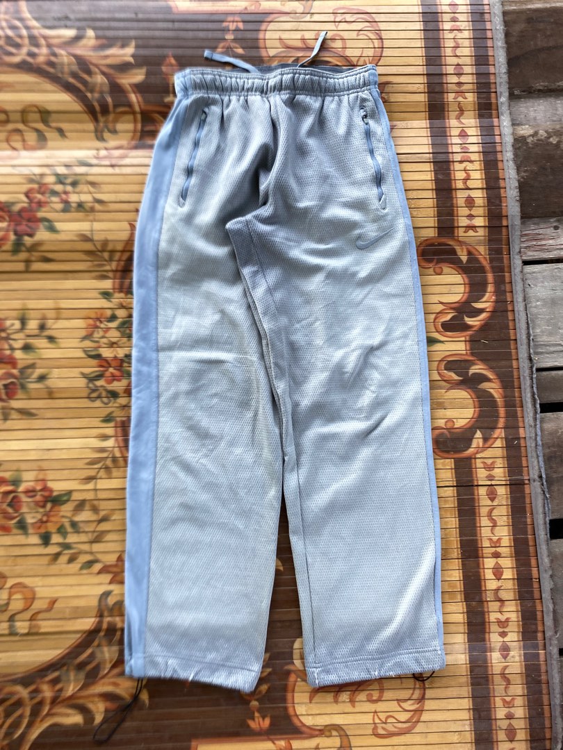 Nike Baggy Trackpant kain seluar sukan, Men's Fashion, Bottoms, Joggers ...