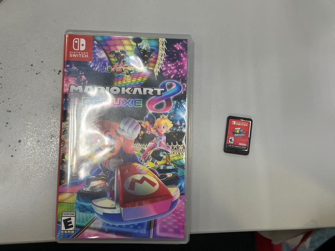 Nintendo Switch Games - Mariokart Deluxe and Super Mario Odyssey, Video ...