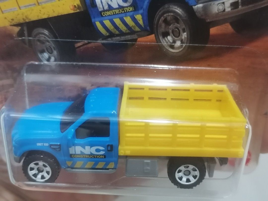 Matchbox 2025 Ford F350 Stake Bed Truck - Blue and Yellow - INC ...