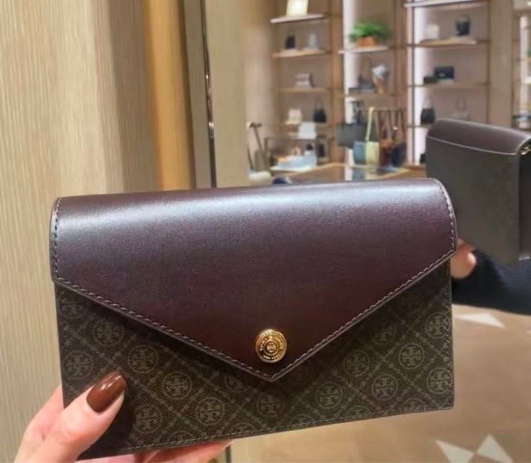 Tory Burch Monogram WOC Bag, Luxury, Bags & Wallets on Carousell
