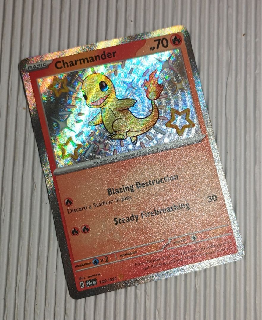S33 閃亮小火龍 Charmander Shiny Rare $280 / 風妖精 Whimsicott Vstar $40 / 伊貝 ...