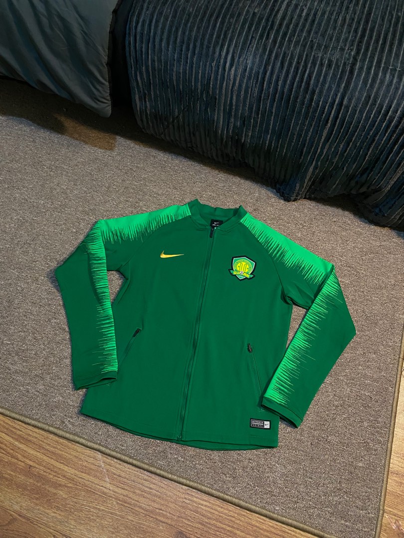 Nike Green Running Jacket, Fesyen Pria, Pakaian , Baju Luaran di Carousell