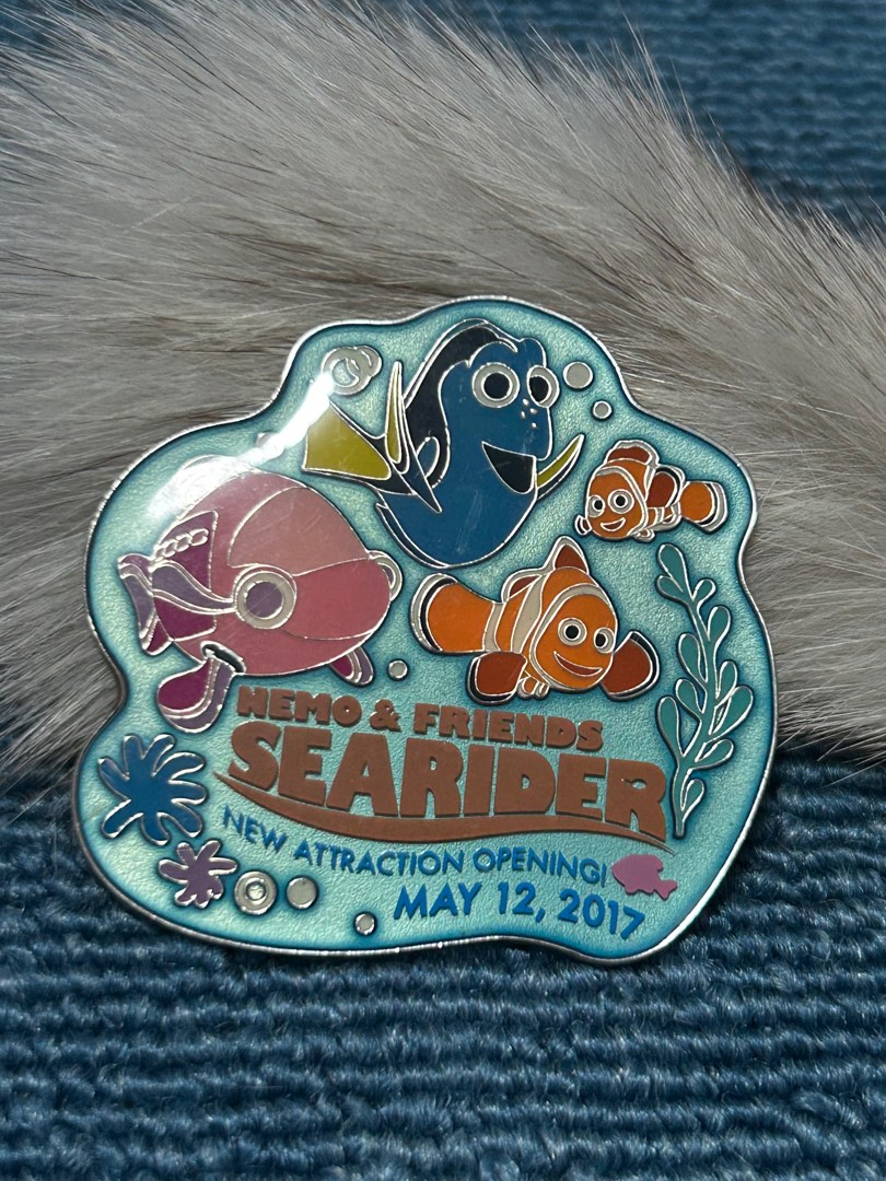 Disney pin commemorating the opening of the "Nemo & Friends SeaRider ...