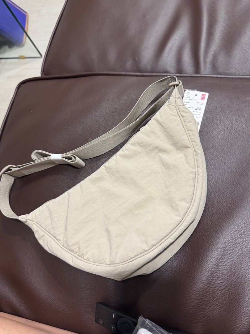 Uniqlo round mini should bag, Women's Fashion, Bags & Wallets, Shoulder ...