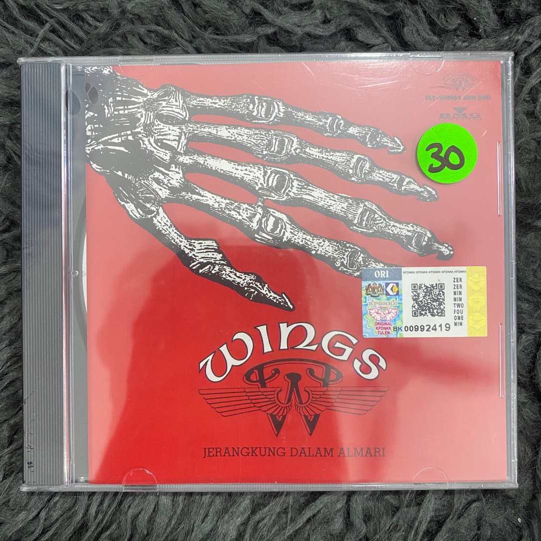 CD WINGS Jerangkung Dalam Almari, Hobbies & Toys, Music & Media, CDs ...