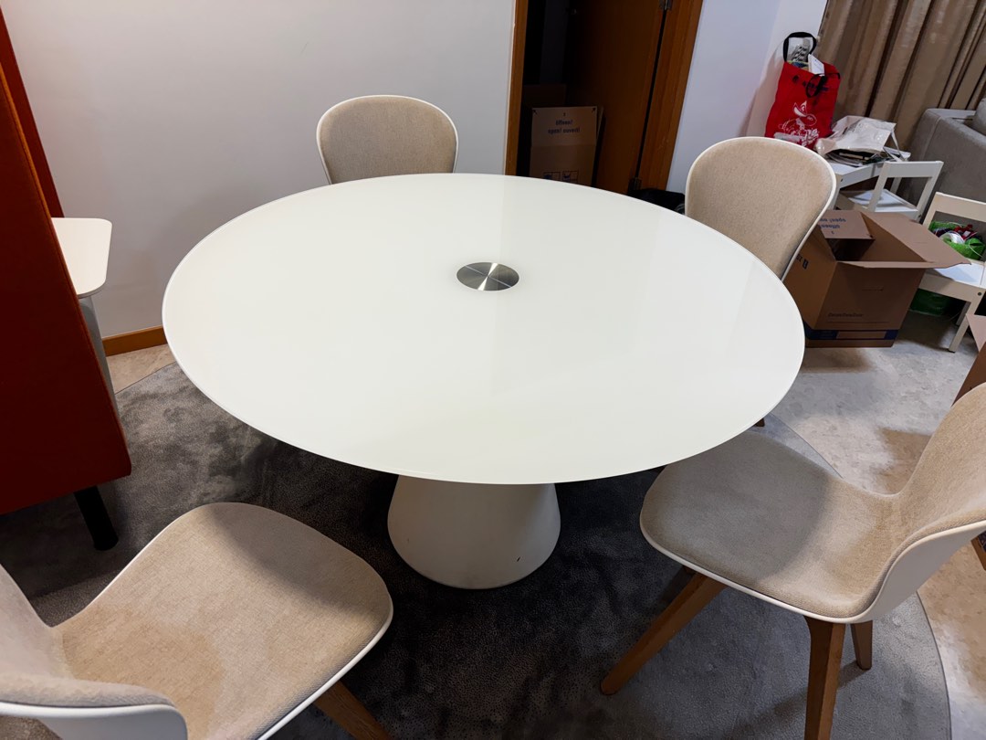 Elegant white glass round dining table set with matching carpet ...