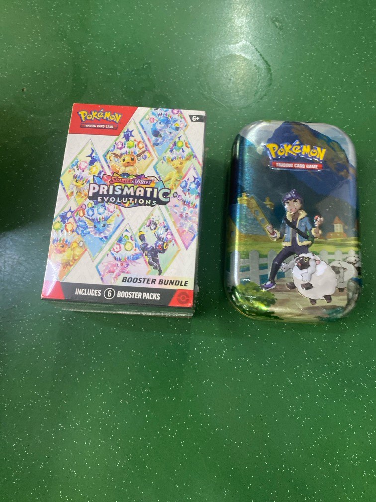 Prismatic evolutions string/ crown zenith mini tin, Hobbies & Toys ...