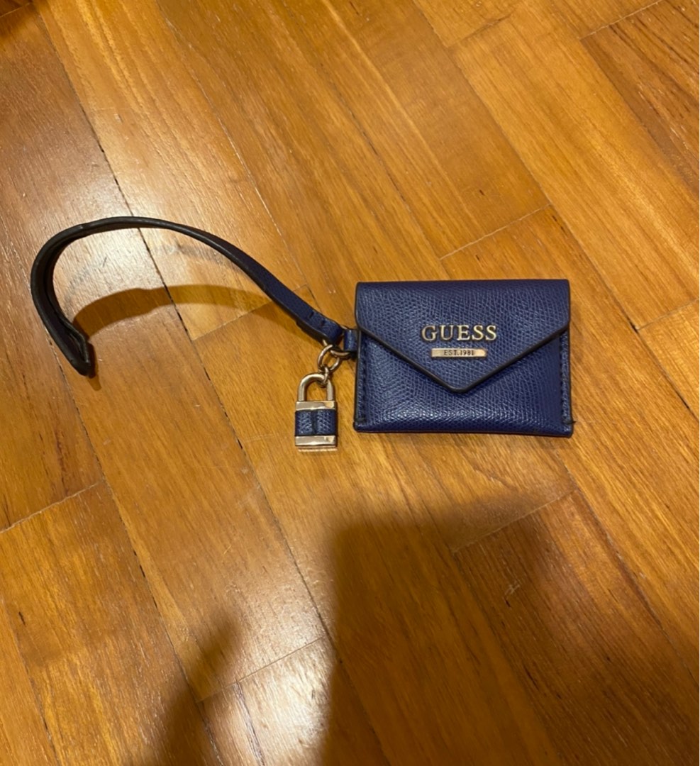 Guess bag tag, Women's Fashion, Bags & Wallets, Wallets & Card Holders ...