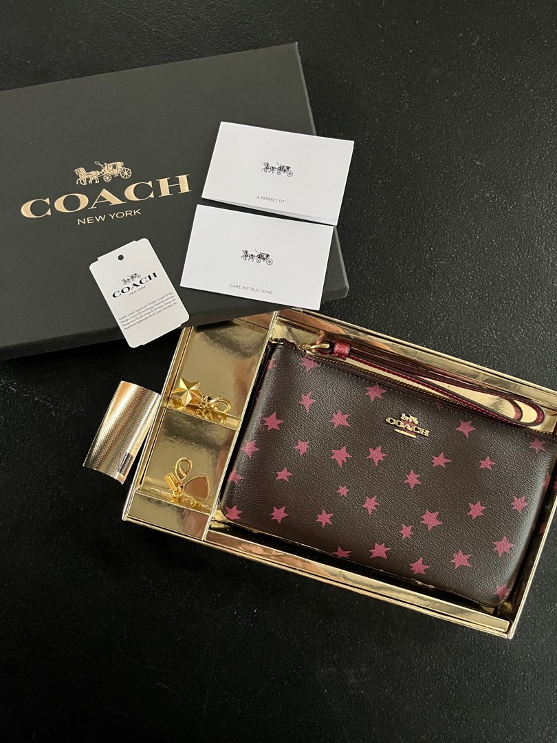 COACH Star Pattern Wrislet with Charms, Luxury, Bags & Wallets on Carousell