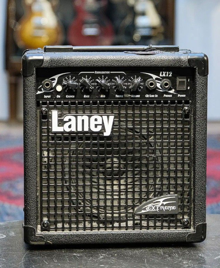 Laney (UK) LX12 combo amp with 6 inch speaker built in . 12w solid ...