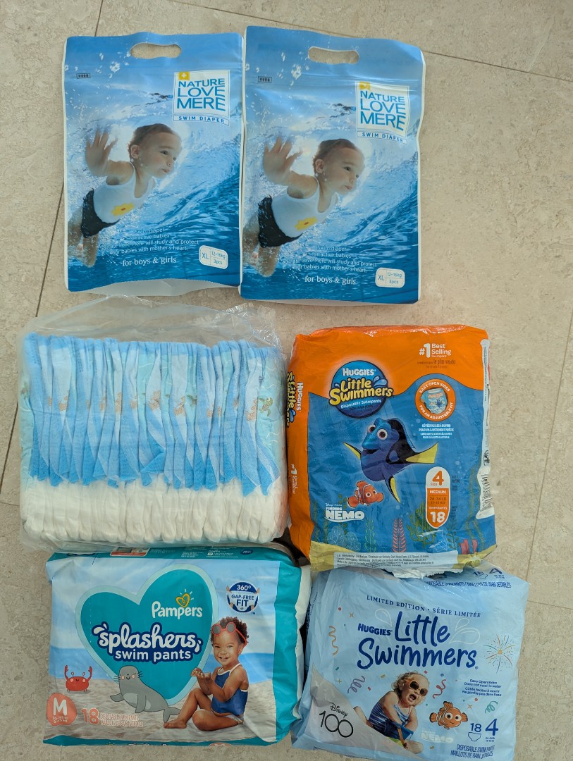 Baby swim diapers, float, and vest bundle, Garage Sale on Carousell