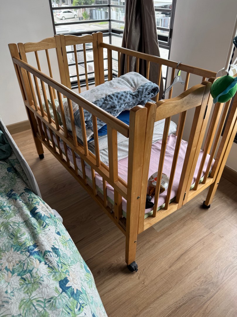 Wooden foldable baby bed with wheel baby crib, Babies & Kids, Baby ...