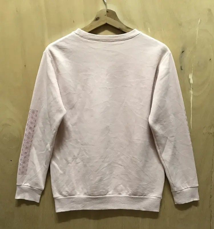 GU X Demon Slayer Sweatshirts, Women's Fashion, Tops, Other Tops on ...