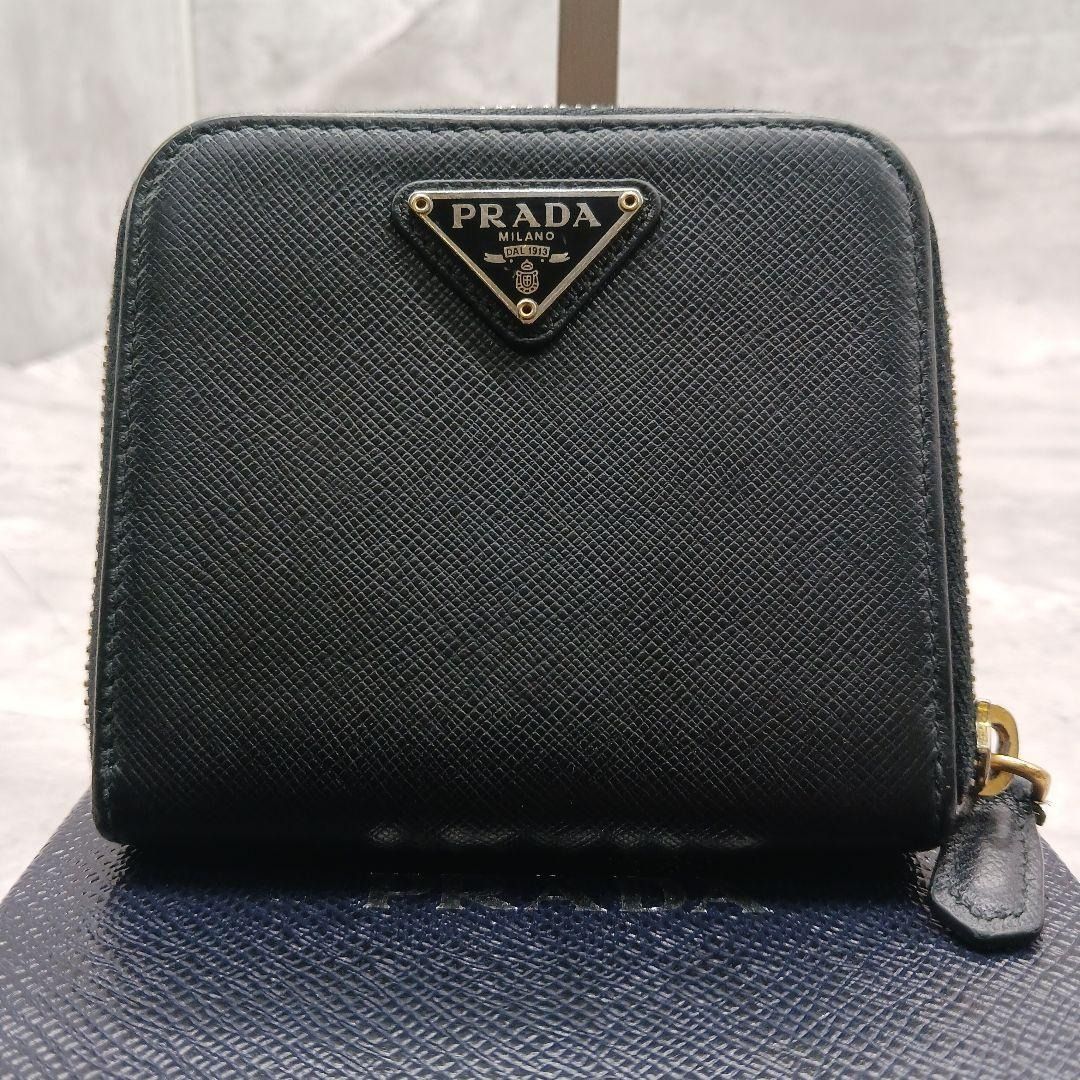 Authentic Prada Saffiano triangle logo bi-fold compact wallet in black ...