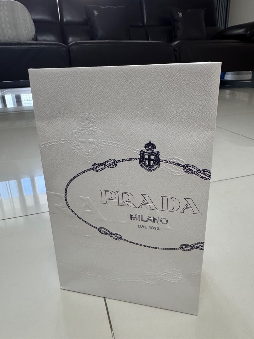 Prada paper bag, Luxury, Sneakers & Footwear on Carousell