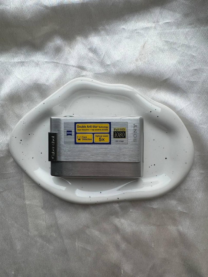 Sony t100 silver digicam, Photography, Cameras on Carousell