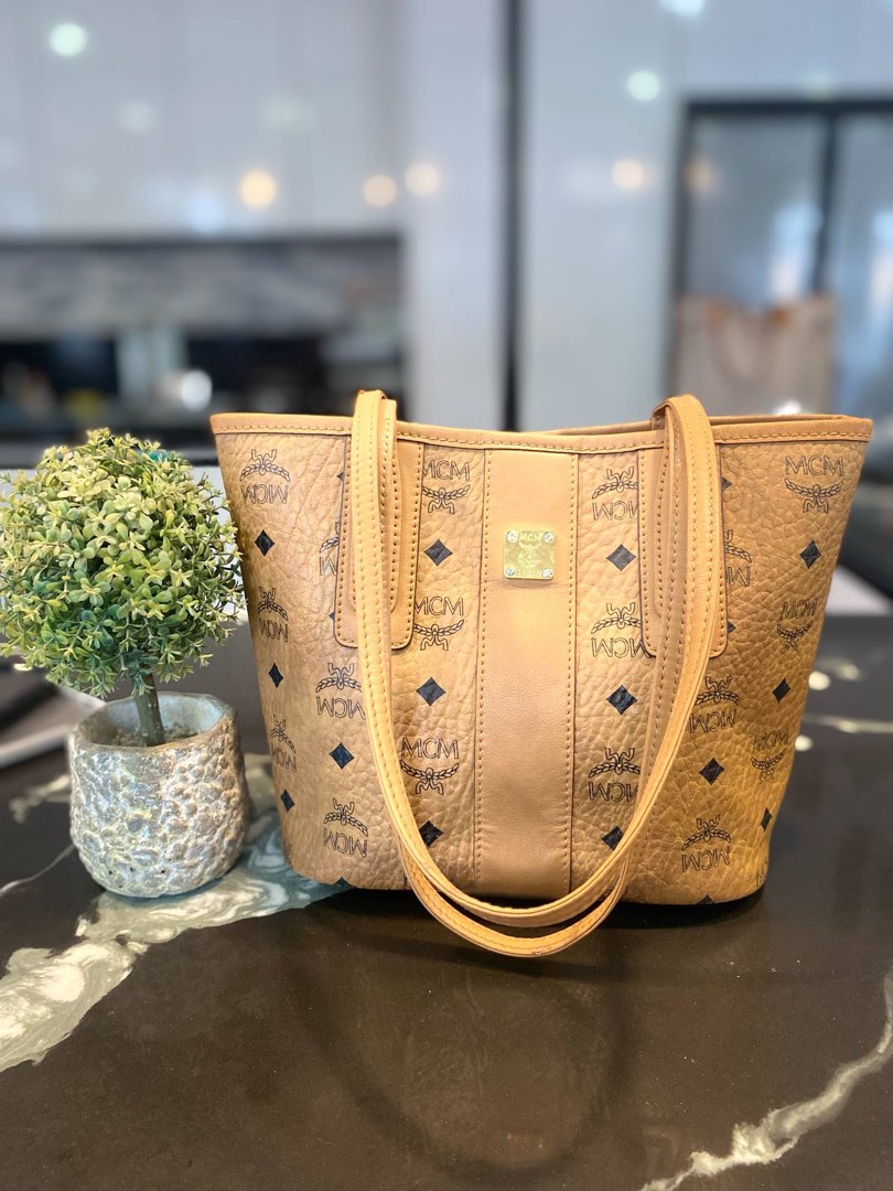 MCM bucket, Luxury, Bags & Wallets on Carousell
