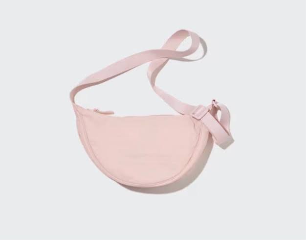uniqlo light pink dumpling bag, Women's Fashion, Bags & Wallets, Cross ...