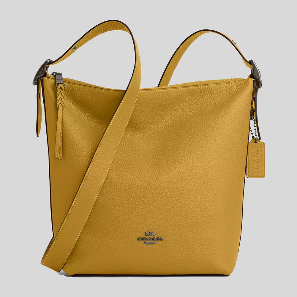 Coach Outlet Val Duffle yellow, Luxury, Bags & Wallets on Carousell