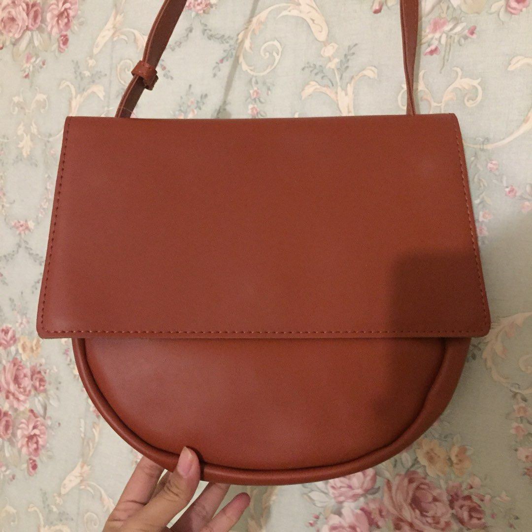 round teracota terracota teracotta coral dark orange sling bag medium ...