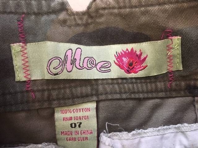 camo mini skirt from MOE... in great condition.. it has a distressed ...