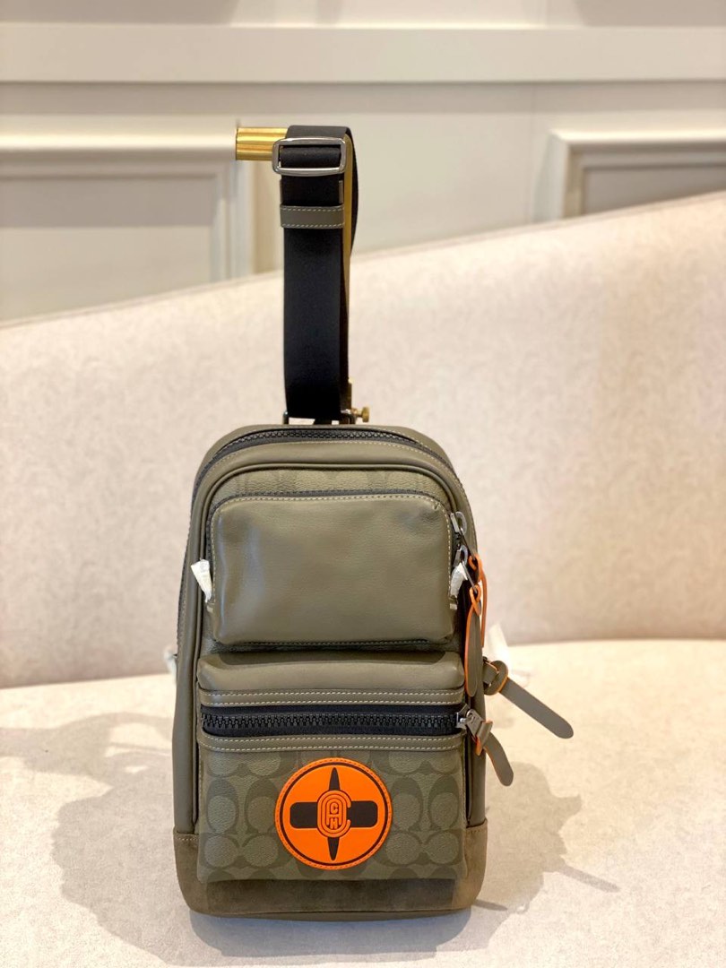 COACH X MICHAEL B. JORDAN RIDER PACK WITH SIGNATURE CAVAS DETAIL SLING ...