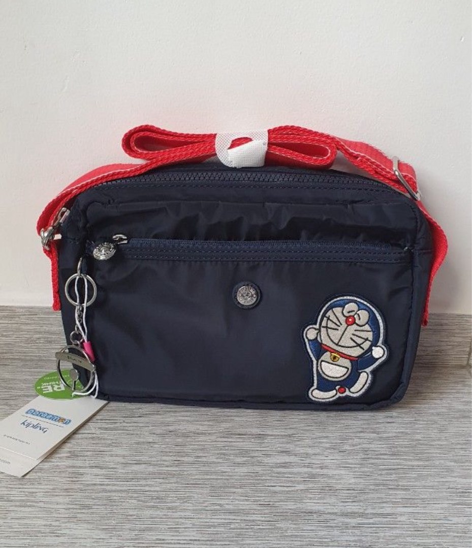 Kipling doraemon, Women's Fashion, Bags & Wallets, Cross-body Bags on ...